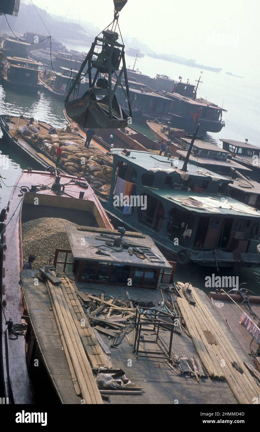 Worker offload Sand for Construction off a Transport ship at the ...