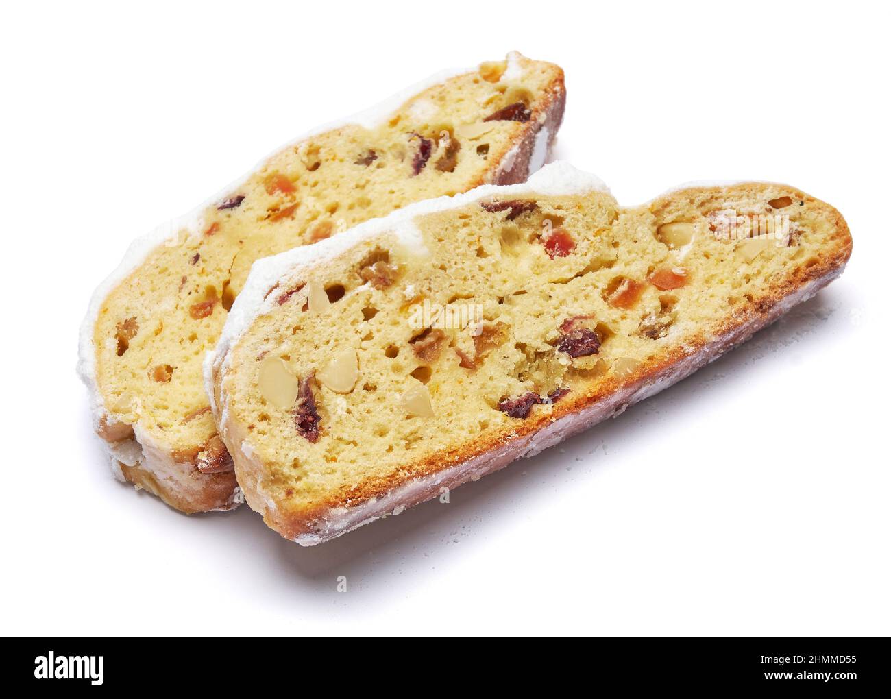 Slices of Traditional Christmas stollen cake with marzipan and dried ...