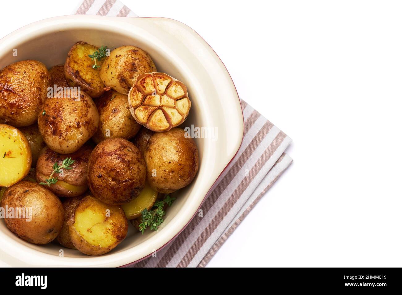 Baked potato in a clay pot isolated on white background Stock Photo - Alamy