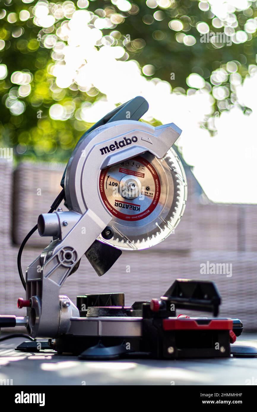 Portrait of an industrial and electrical sawing machine for cutting ...