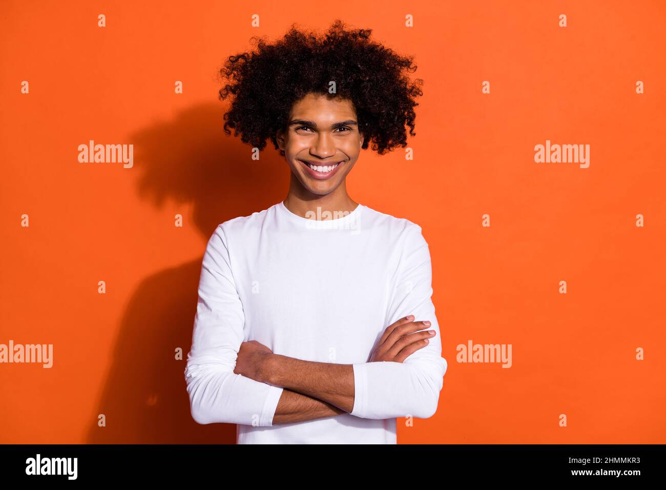 Photo of funky pretty guy dressed white shirt arms crossed smiling ...