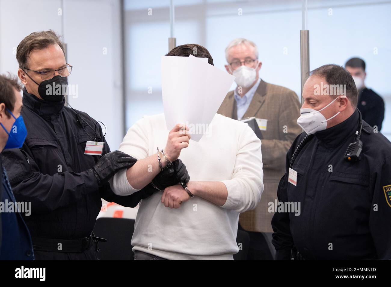 Dresden, Germany. 11th Feb, 2022. A defendant in the trial about the ...