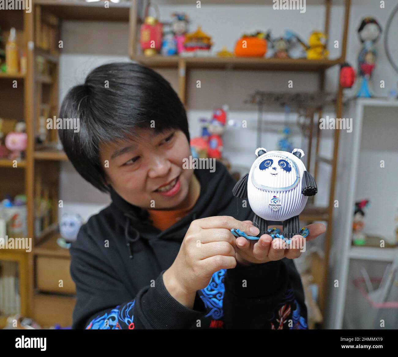 Shenyang, China's Liaoning Province. 10th Feb, 2022. Li Xue, an intangible heritage inheritor ...