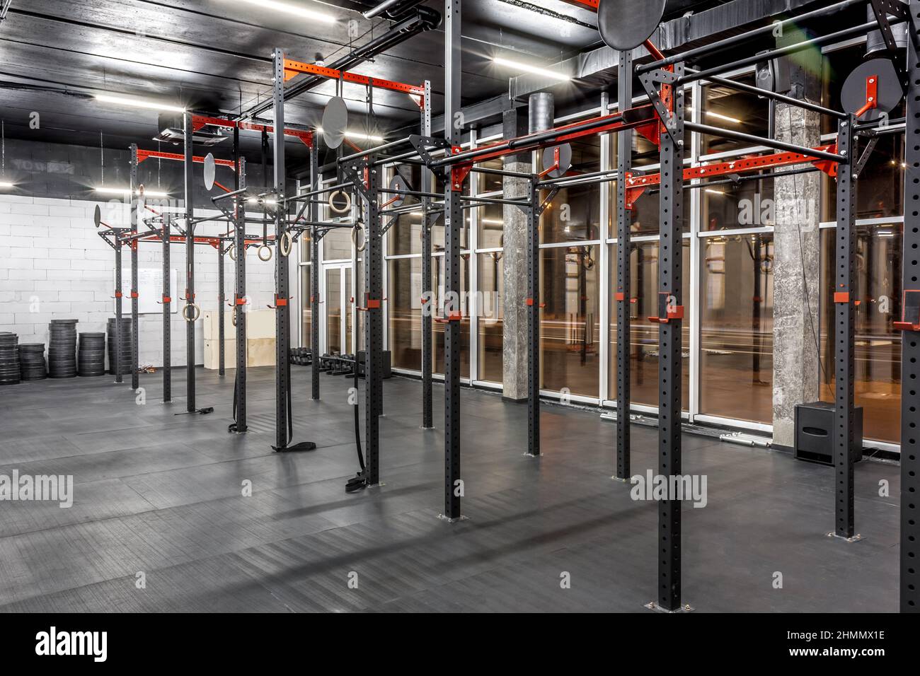 Workout gym for crossfit with modern interior. Special equipment by the ...
