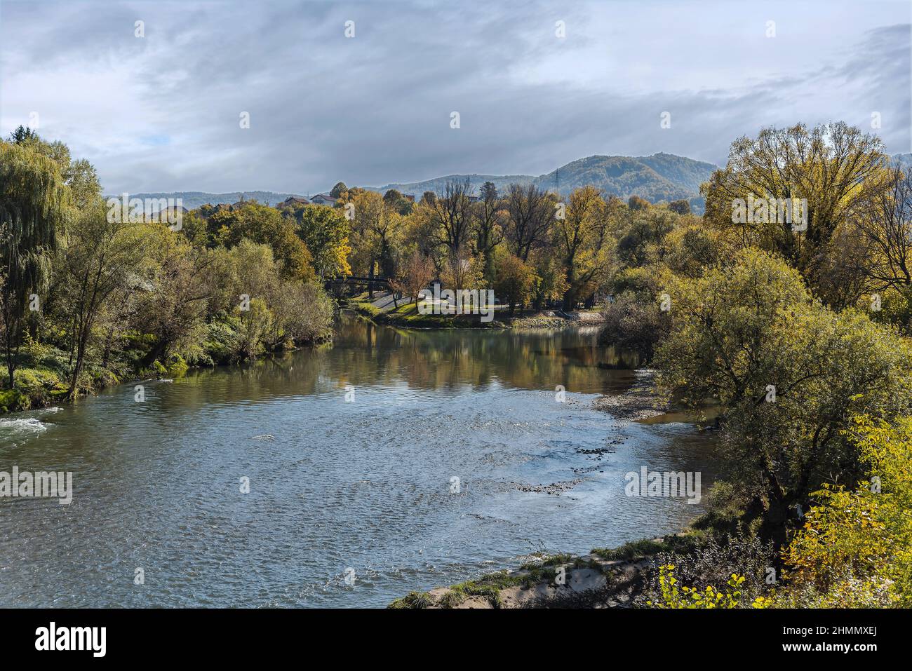 Beautiful river in Banja Luka with blue and gray cloudy sky Stock Photo ...