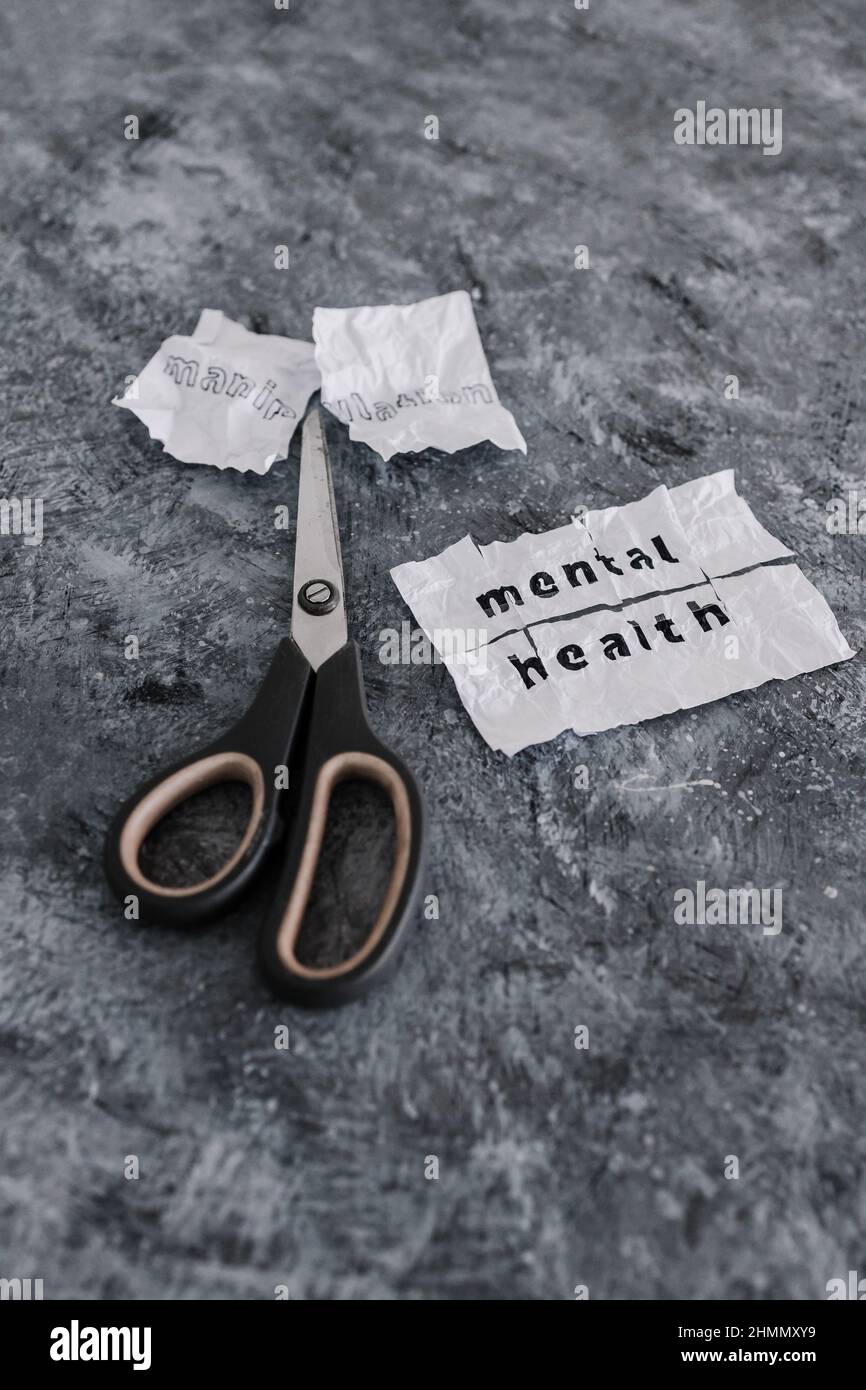 Manipulation text on crumpled piece of paper which is getting cut with ...