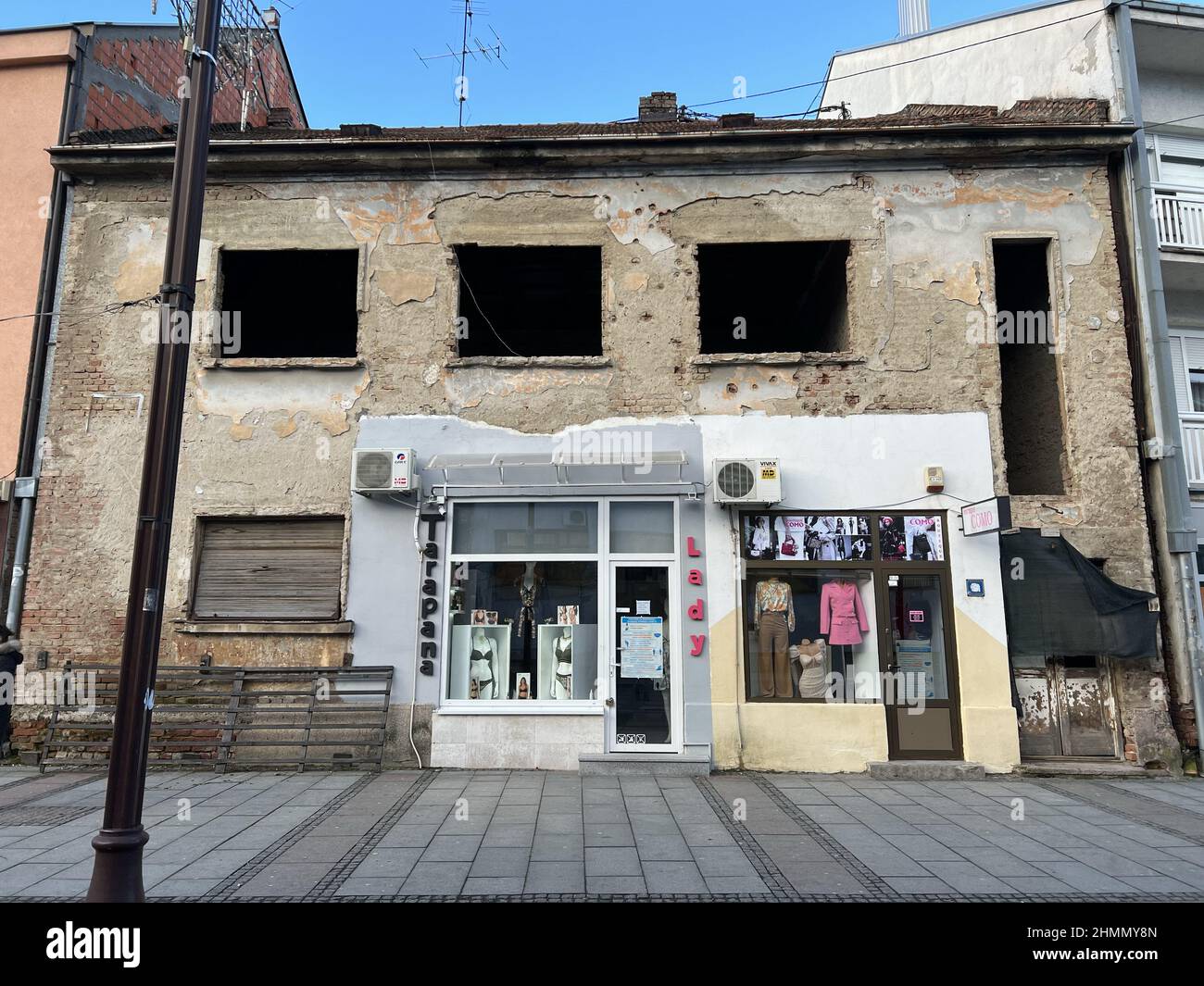Old building with new store in front Stock Photo - Alamy
