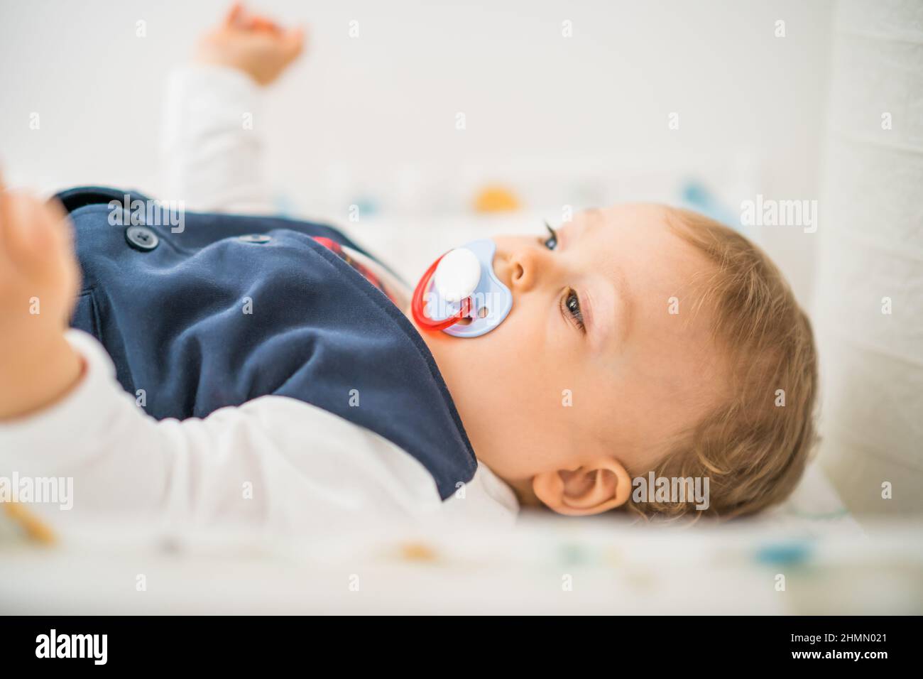 Close up portrait of cute baby boy with pacifier Stock Photo - Alamy