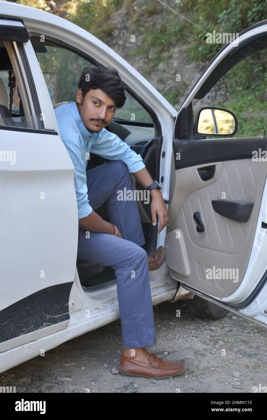 Man Opening Car Door