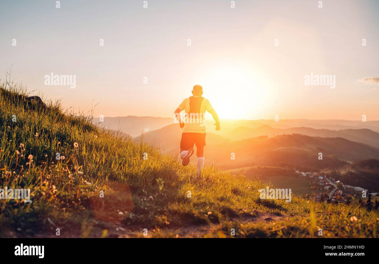 Man running backpack trail hi-res stock photography and images - Alamy