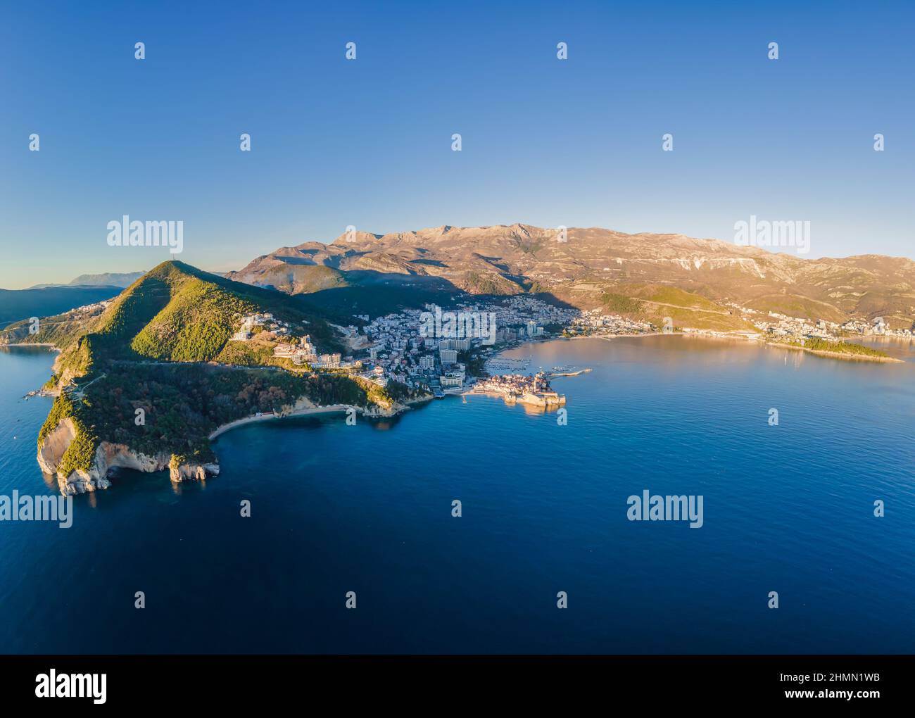 Aerial View Of Sveti Nikola Budva Island Montenegro Hawaii Beach Umbrellas And Bathers And