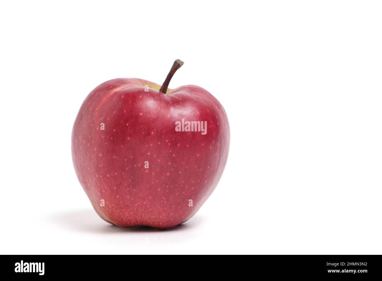 Bright red, juicy apple on white background Stock Photo - Alamy