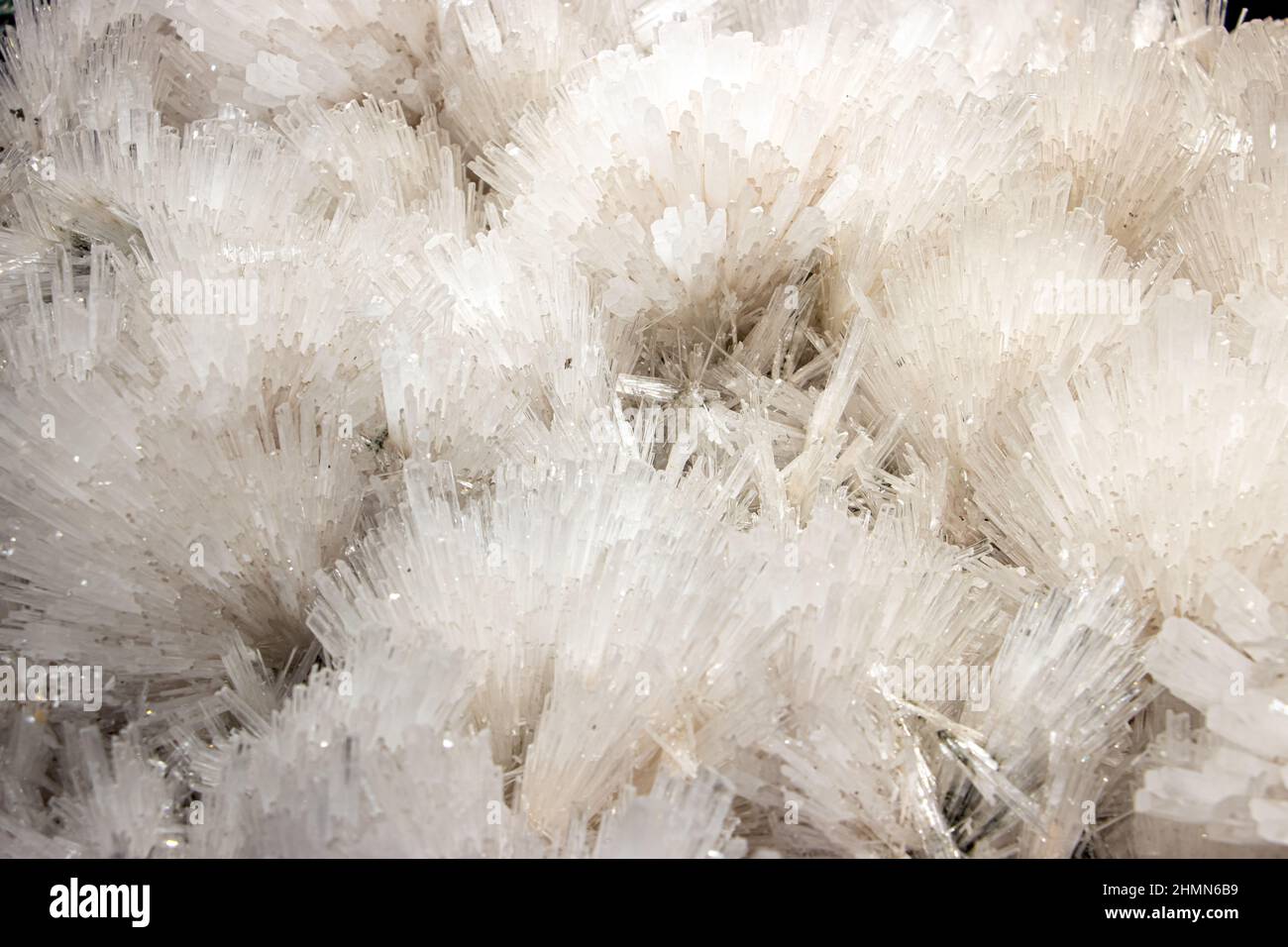 A natural mineral stone - raw Scolecite, a tectosilicate mineral of the ...