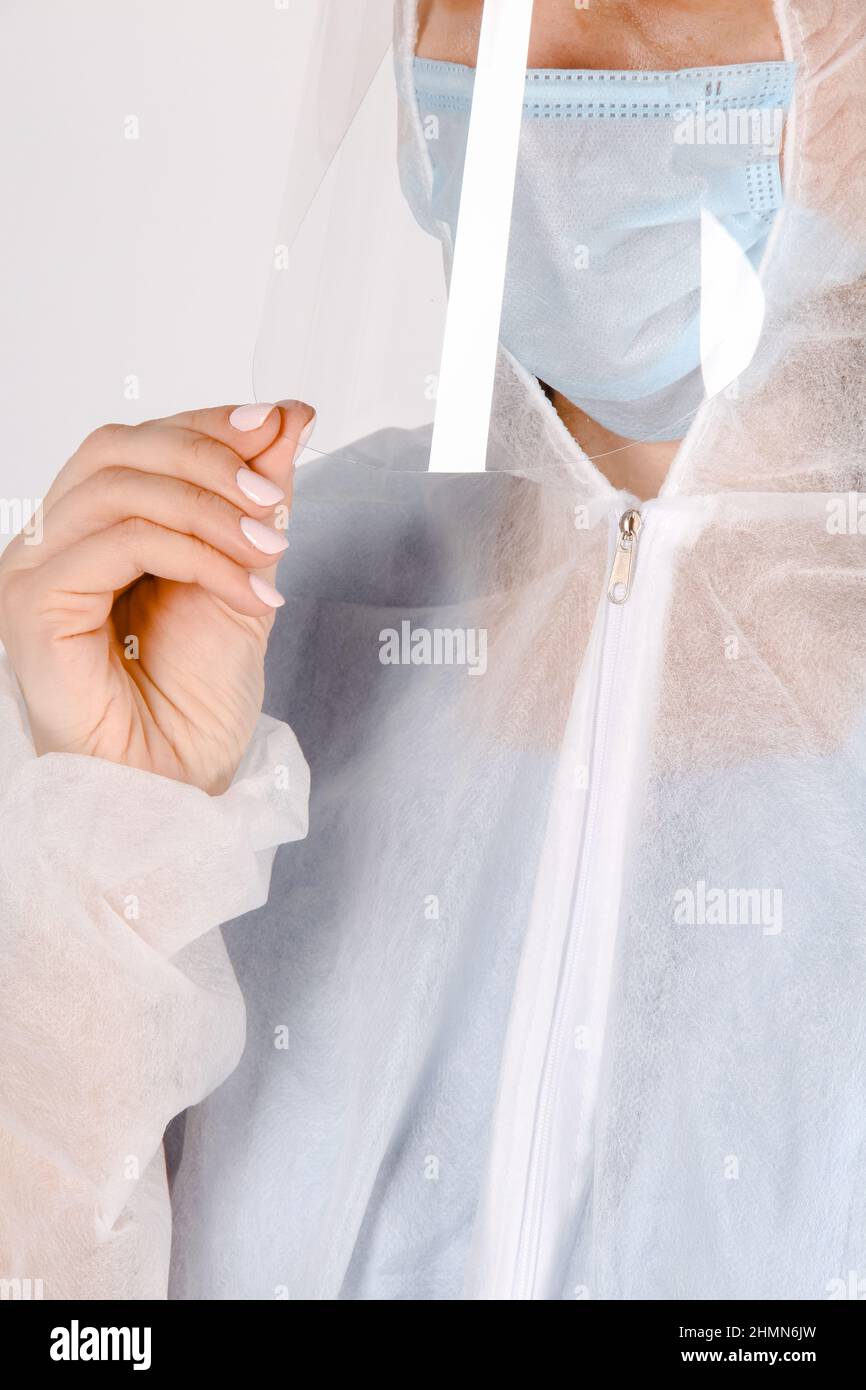 Female doctor wearing personal protective equipment in hospital ...