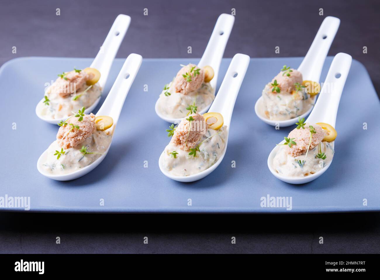 Cold appetizer made from cod liver, cod caviar, olives, cucumber and ...