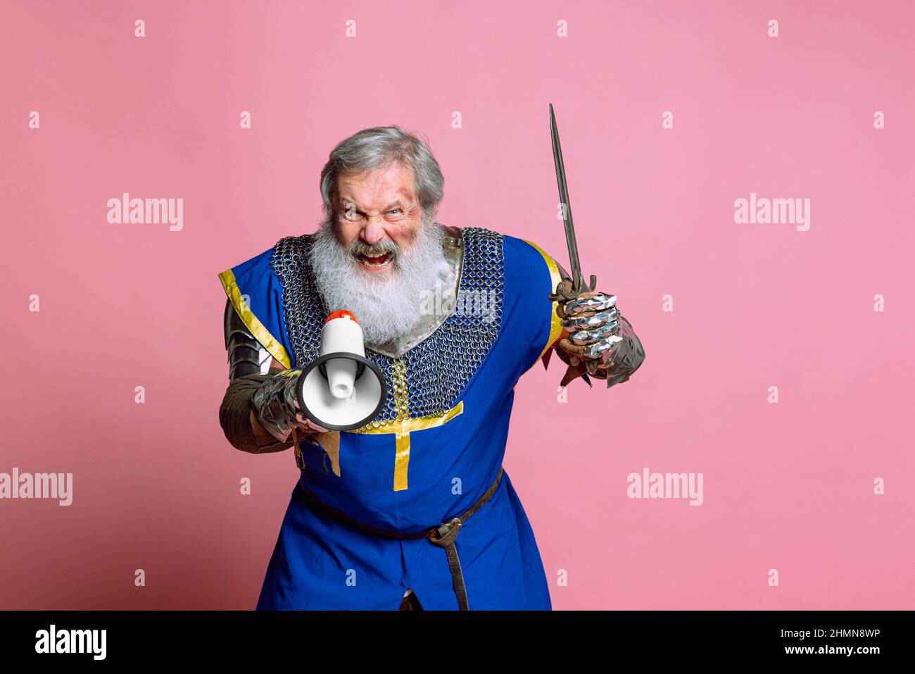Portrait of senior grey bearded man, brave medieval warrior or knight ...