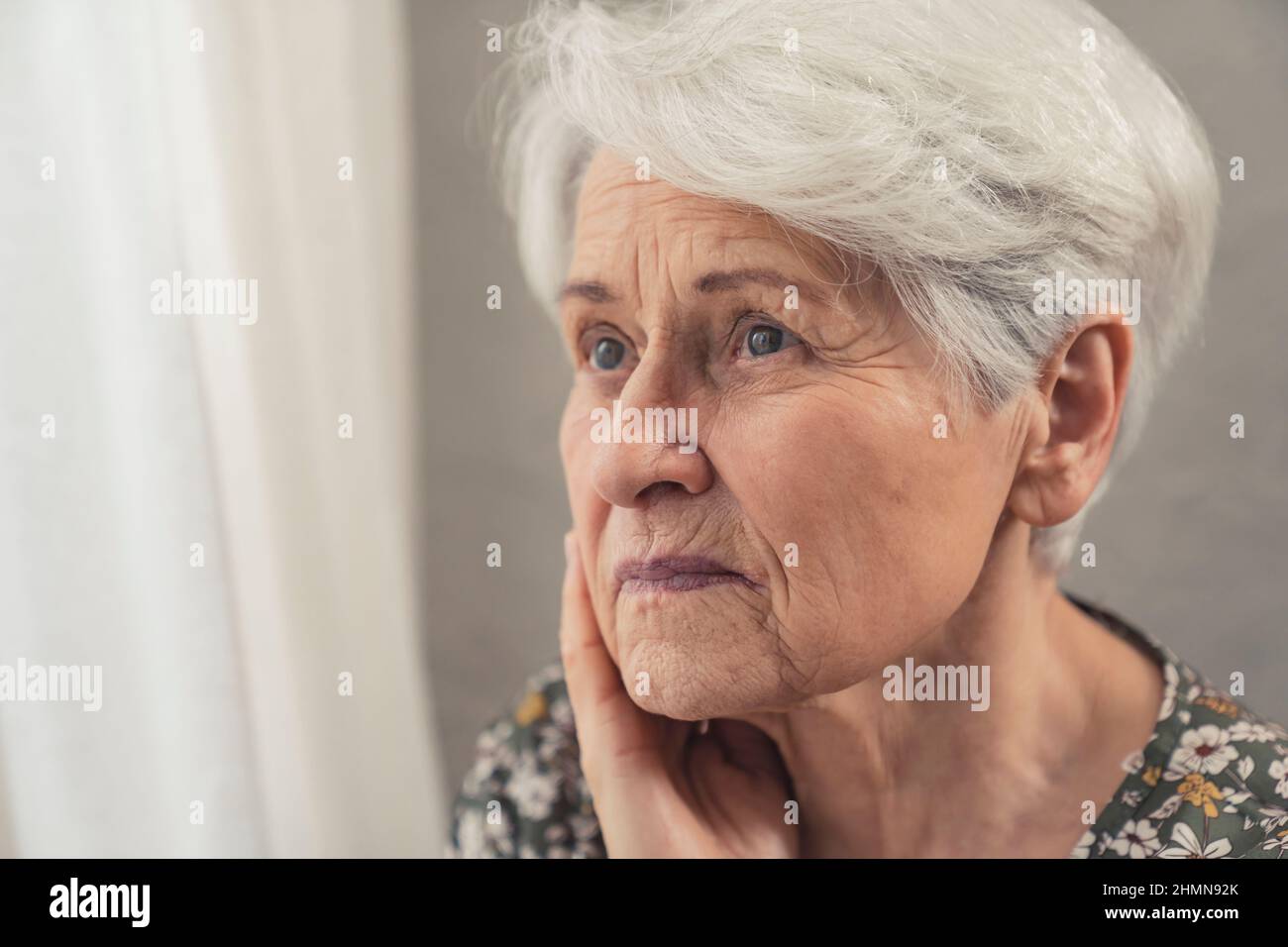 Elderly woman grey hair sad hi-res stock photography and images - Alamy