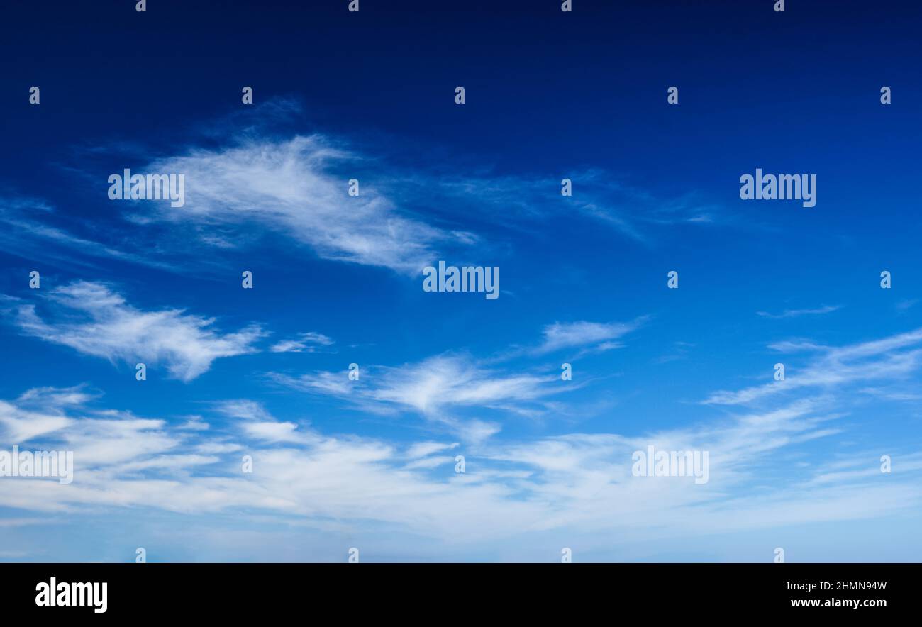 Blue clear sky with clouds Stock Photo - Alamy