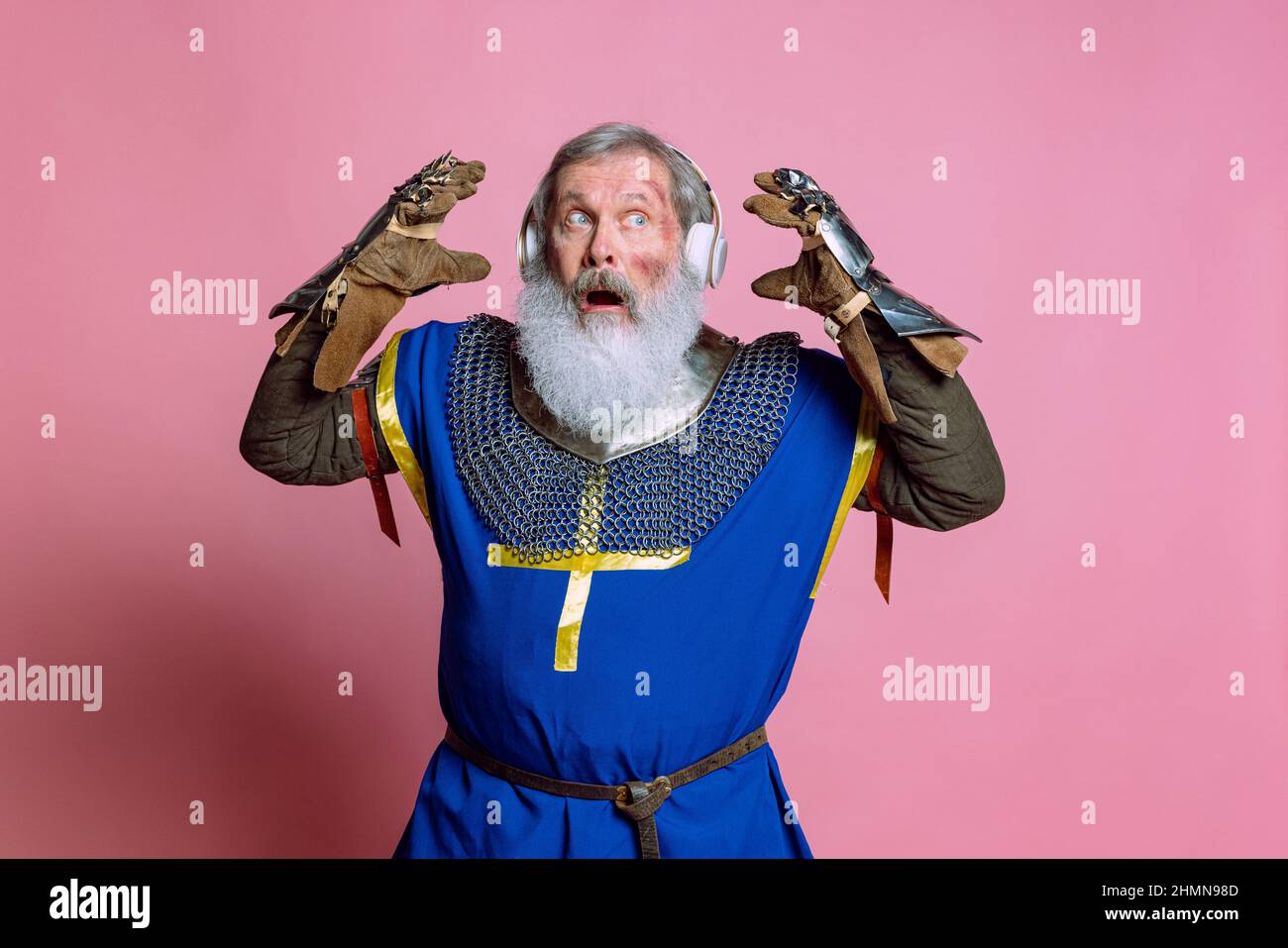 Portrait of senior grey bearded man, brave medieval warrior or knight ...