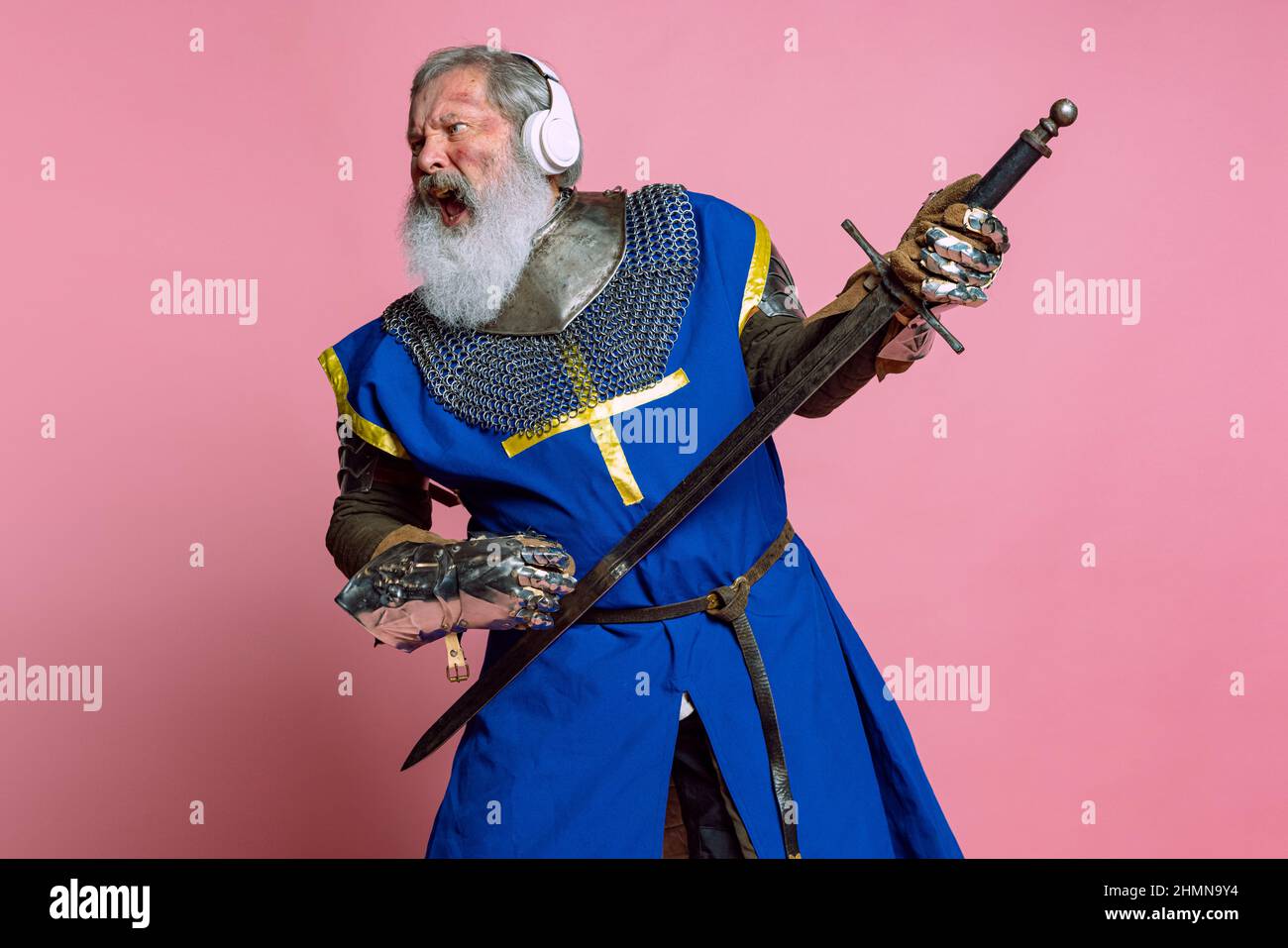 Portrait of senior grey bearded man, brave medieval warrior or knight ...