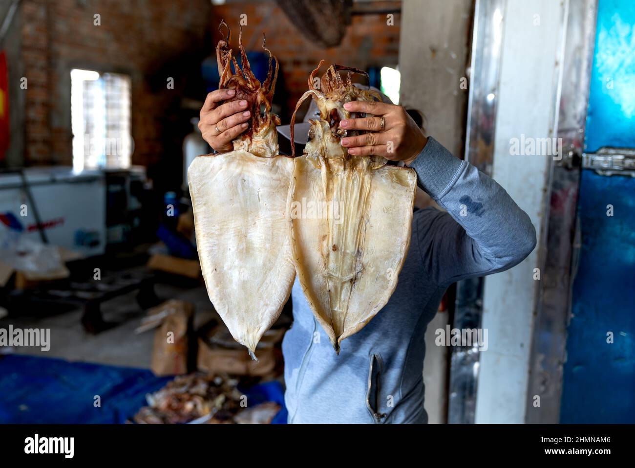 Quy Nhon, Binh Dinh province, Vietnam - January 1, 2022: dried squid ...