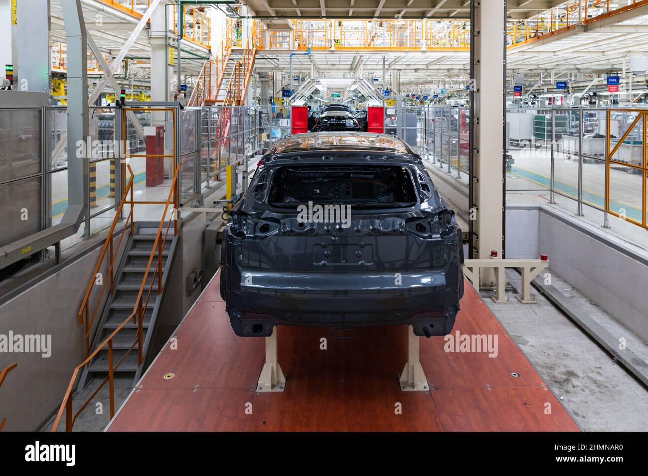 Photo of automobile production line. Welding car body. Modern car ...