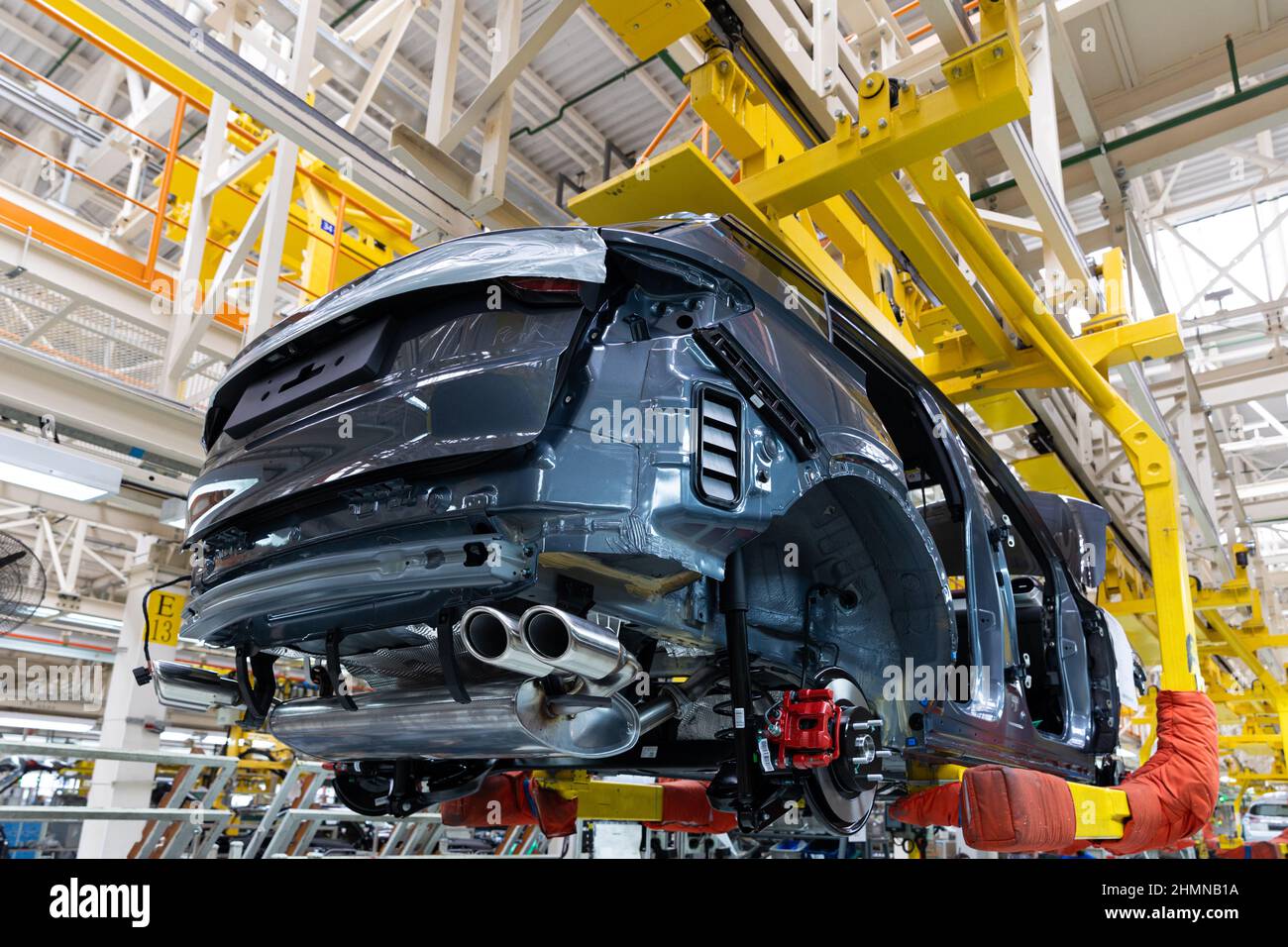 Photo of automobile production line. Welding car body. Modern car ...