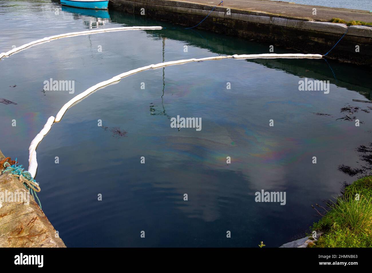 Anti Oil Pollution Booms holding back Diesel polluted water. Keelbeg ...