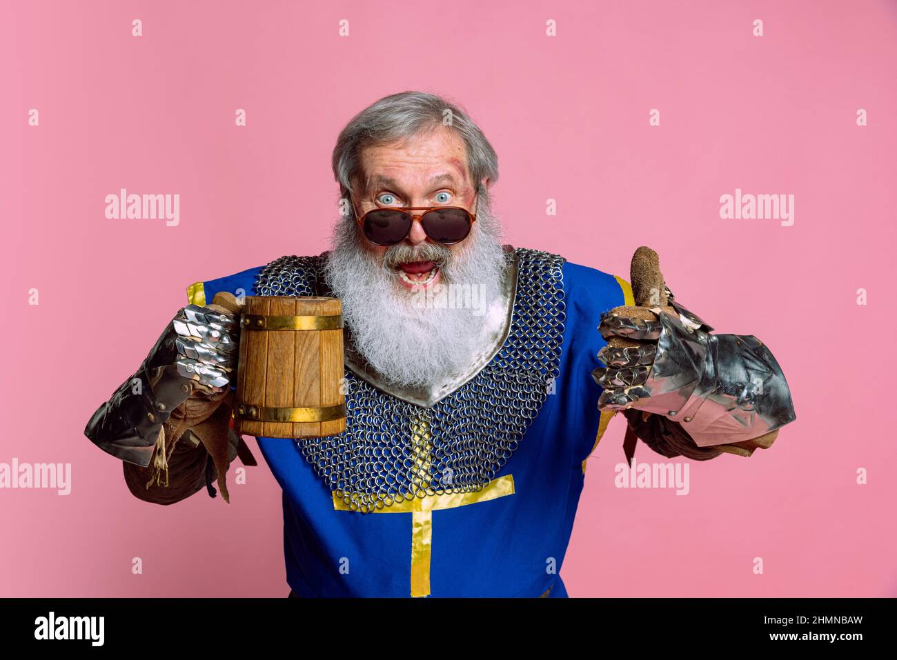 Portrait of senior grey bearded man, brave medieval warrior or knight ...