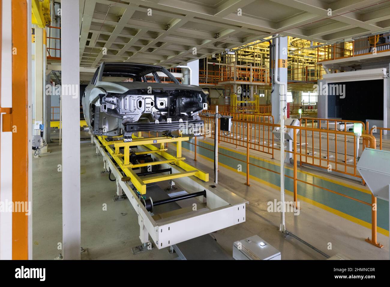 Car bodies are on assembly line. Factory for production of cars. Modern ...