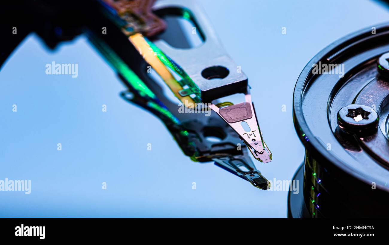 Macro Close up of inside of magnetic Hard Disc Drive with mirror ...