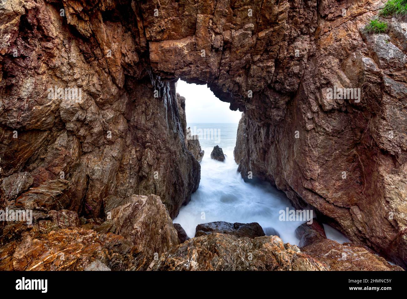 "Mui Vi Rong" with a rock cave connecting to the sea, a wild beauty in ...