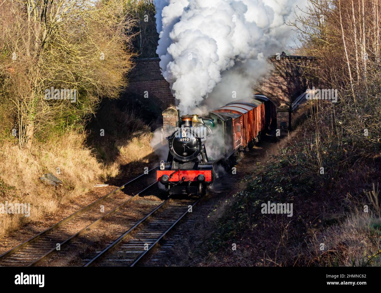 GWR locomotive 6990 Witherslack Hall with a goods train heading south ...