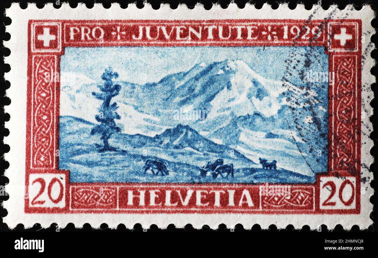 Alpine landscape on vintage swiss postage stamp Stock Photo - Alamy