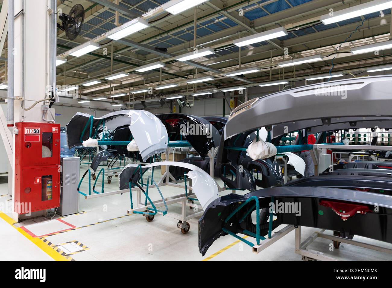 Photo of automobile production line. Welding car body and parts. Modern ...