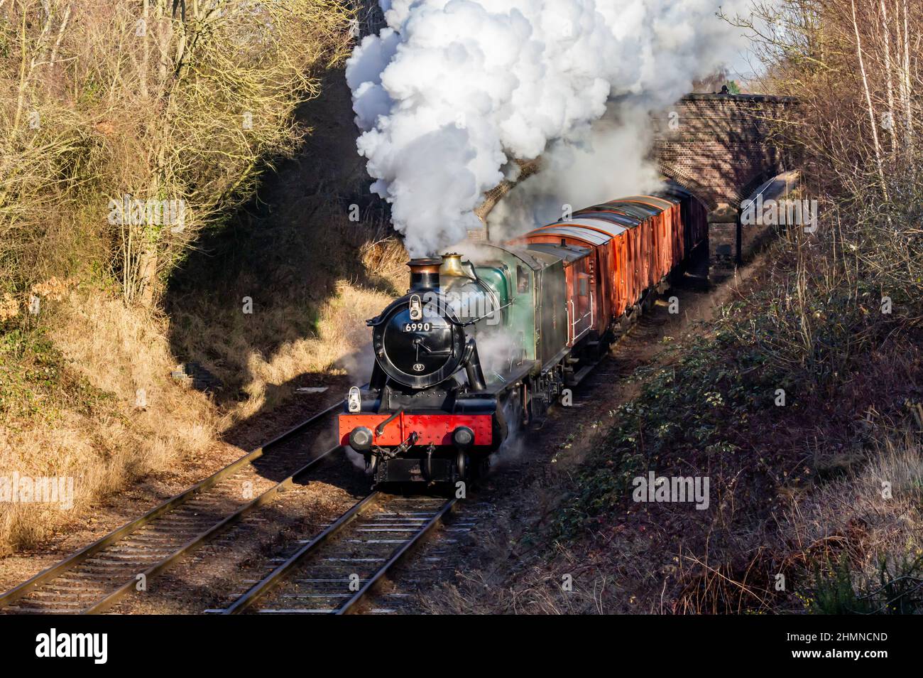 GWR locomotive 6990 Witherslack Hall with a goods train heading south ...