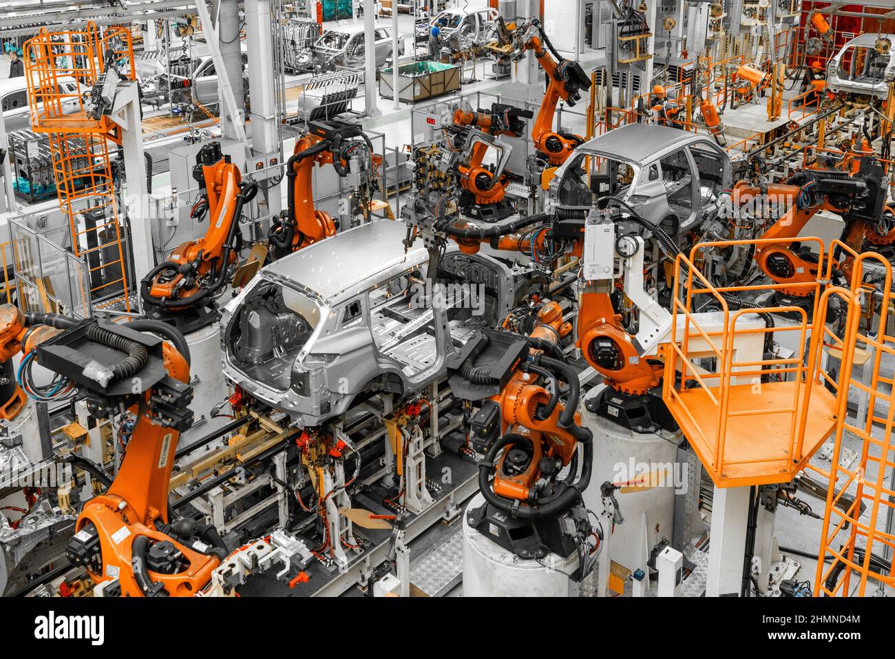 Automobile production line. Welding car body. Modern car assembly plant ...