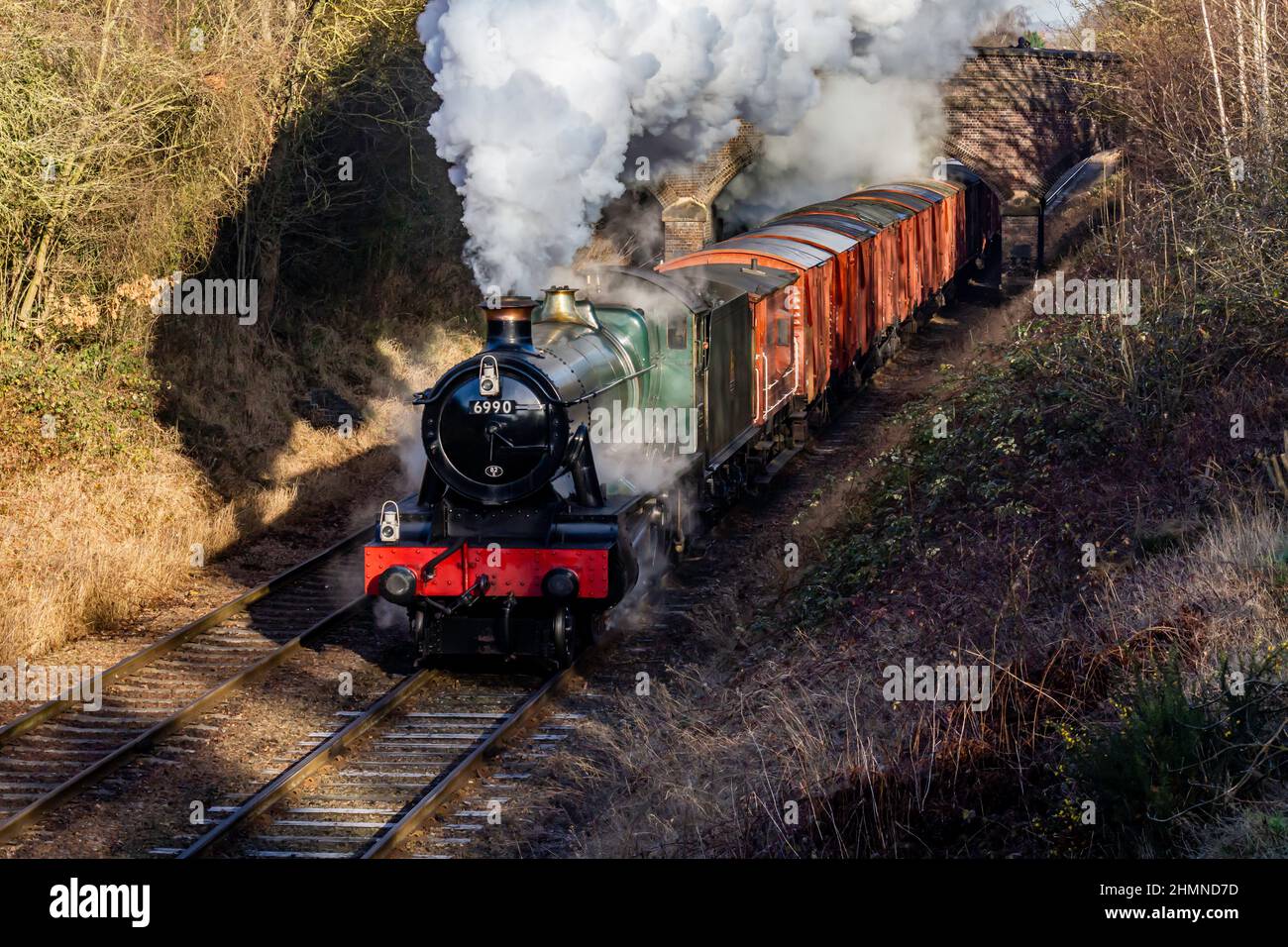 GWR locomotive 6990 Witherslack Hall with a goods train heading south ...