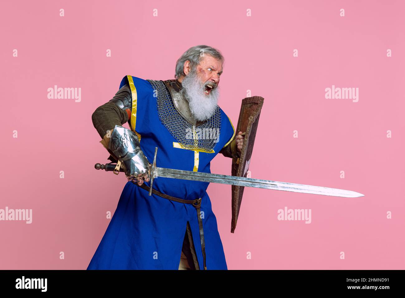 Portrait of senior grey bearded man, brave medieval warrior or knight ...