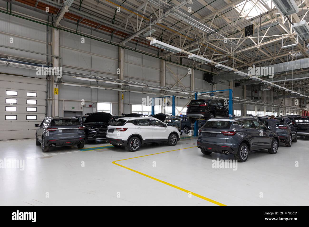 Photo of modern car assembly plant. Interior of a high-tech factory of ...