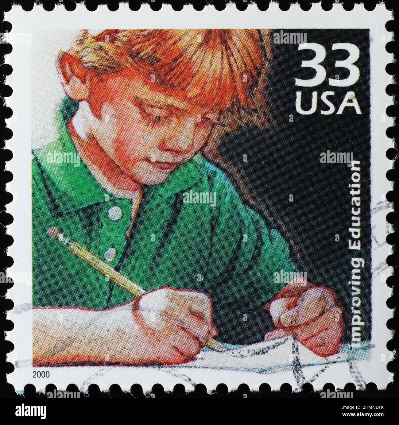 Child learning to write on american postage stamp Stock Photo - Alamy
