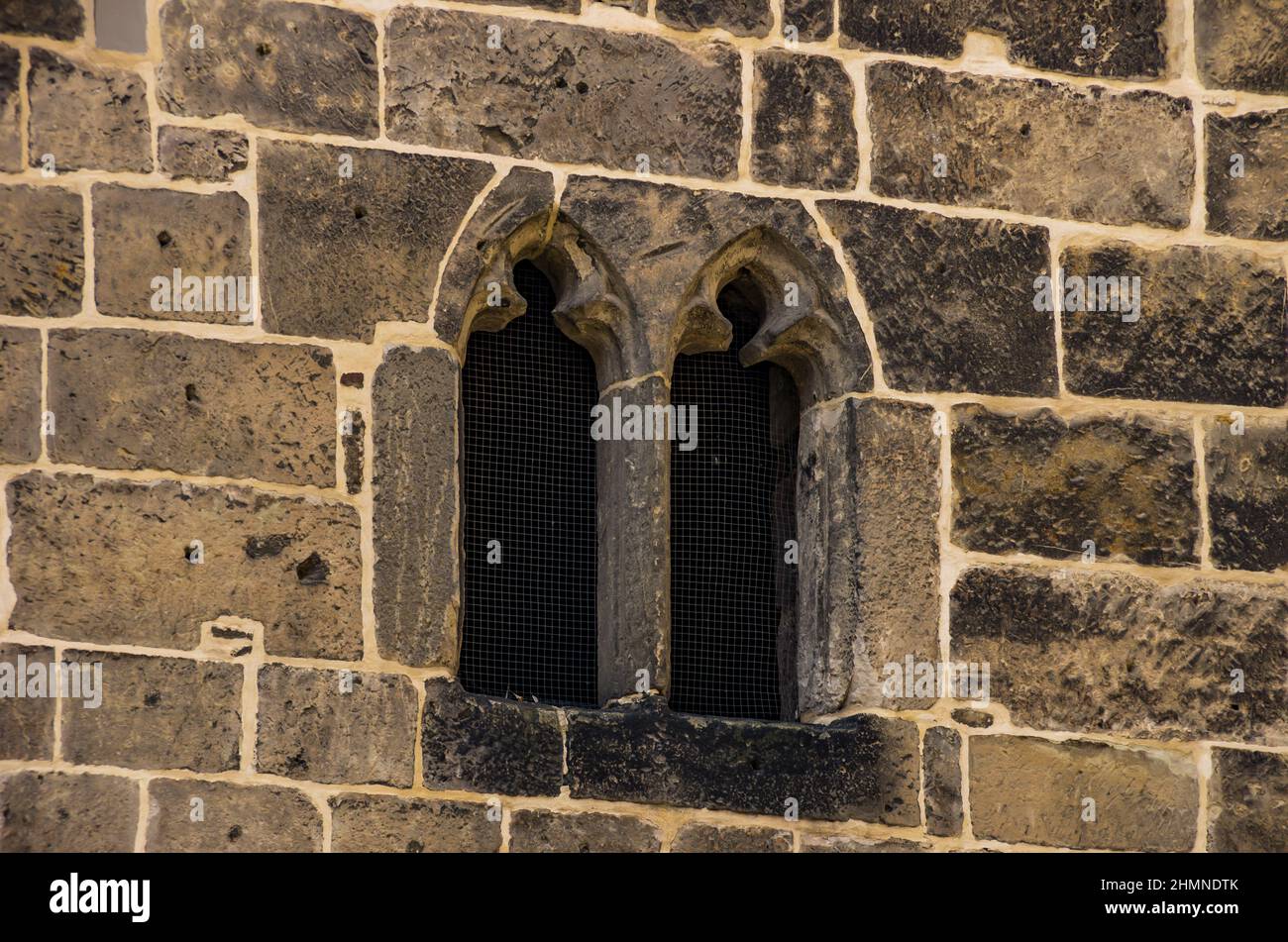 Medieval Gothic window in the form of two so-called nuns' heads in the ...