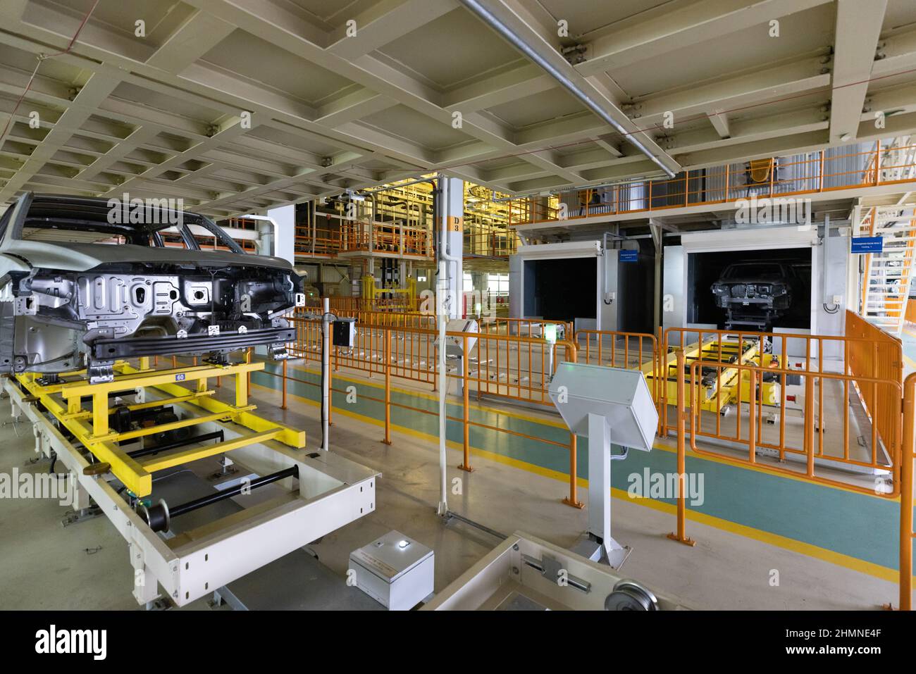 Car bodies are on assembly line. Factory for production of cars. Modern ...