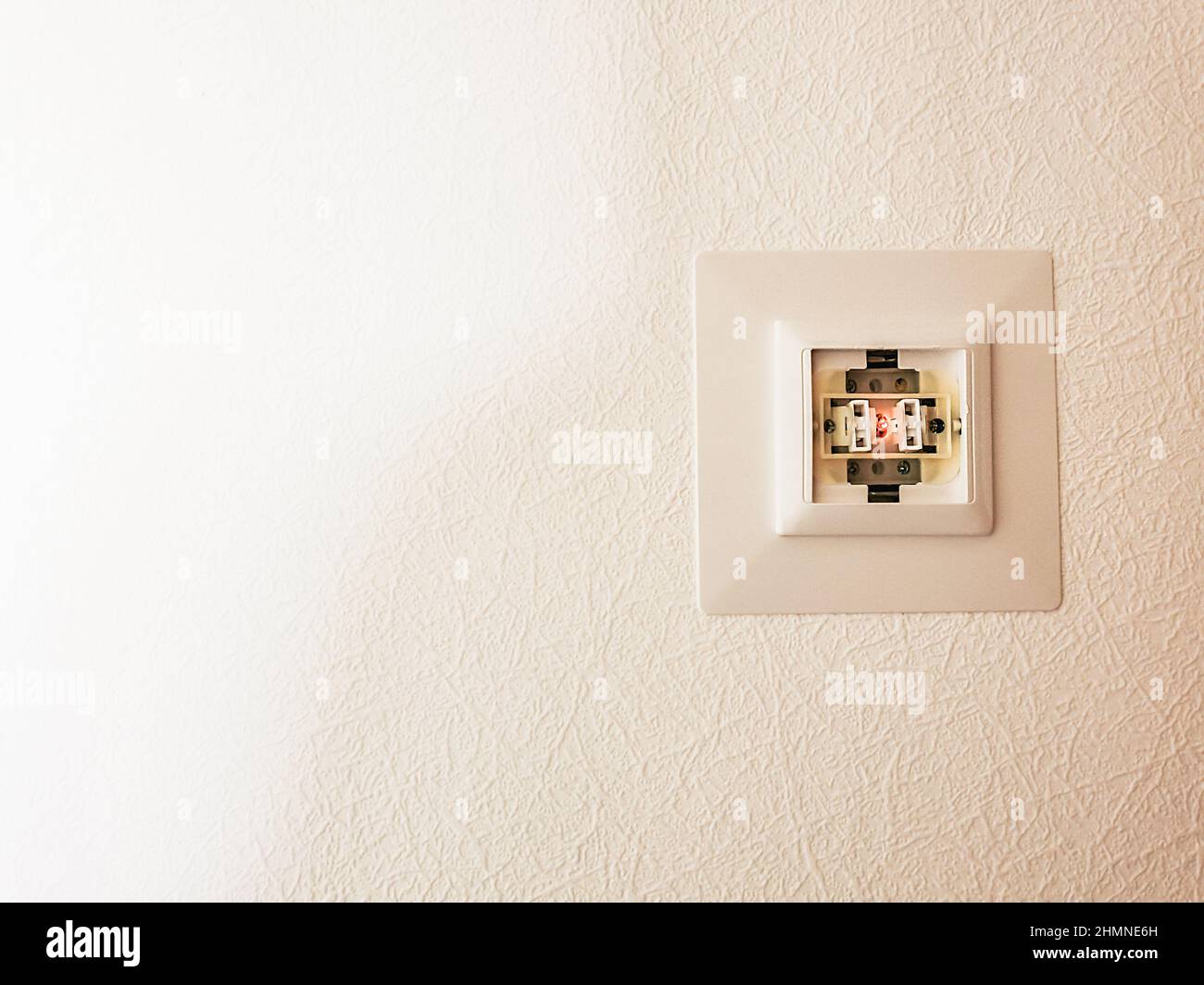 Installing a new electrical outlet. Electrical wiring repair concept ...