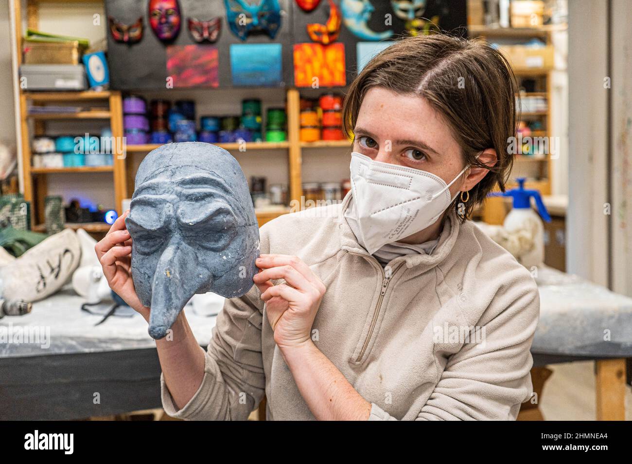 Venice, Italy. 11th Feb, 2022. Handcraft artist, Marina holds a papier ...