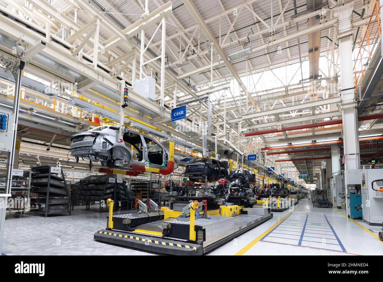 Photo of automobile production line. Welding car body. Modern car assembly plant. Auto industry ...