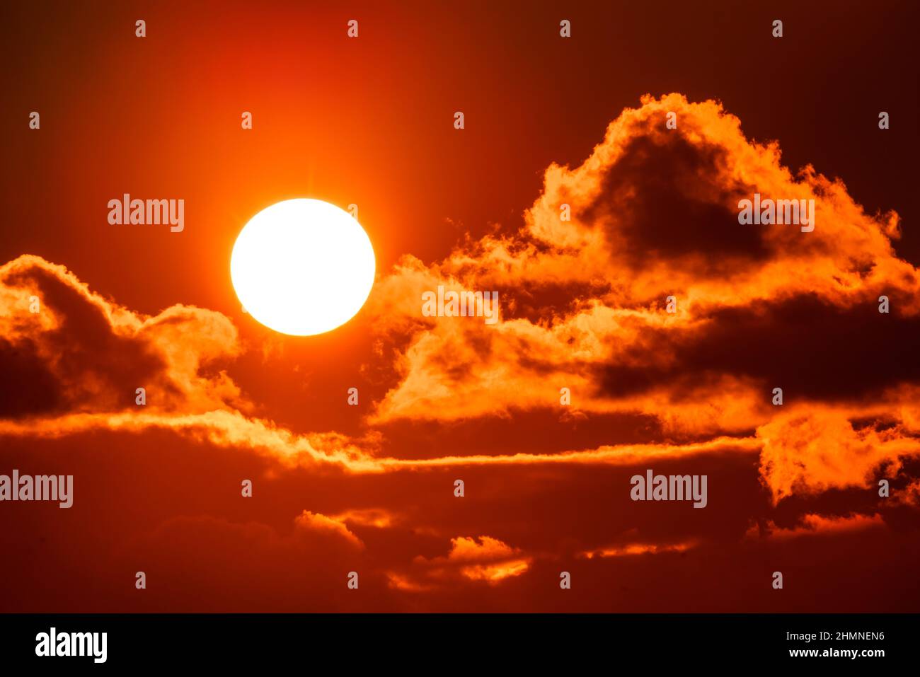 Sky with sun in clouds of altitude. Cloud the evening sky at sunset ...