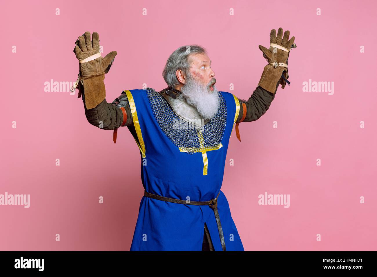 Portrait of senior grey bearded man, brave medieval warrior or knight ...