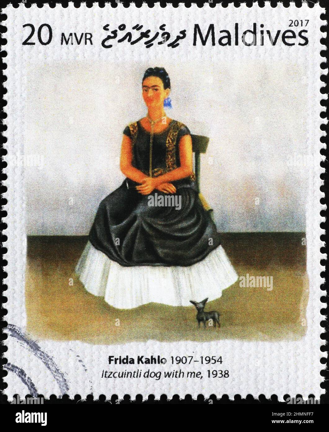 Self portrait with dog by Frida Kahlo on postage stamp Stock Photo - Alamy