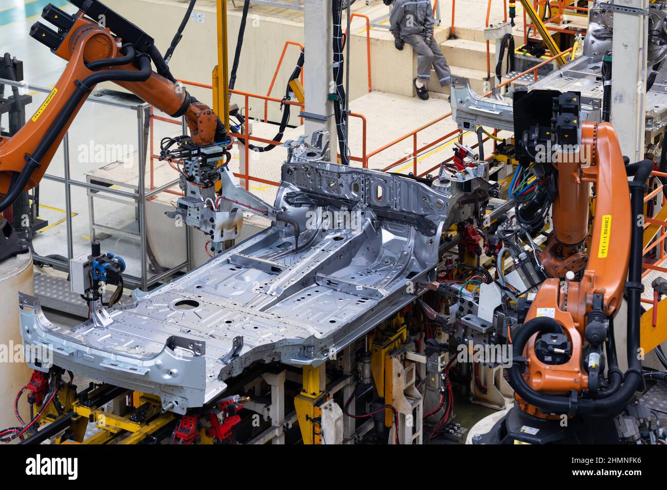 Photo of automobile production line. Welding car body. Modern car ...